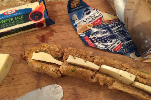 Boudin King Cake is a savory and spicy version of the Mardi Gras tradition.