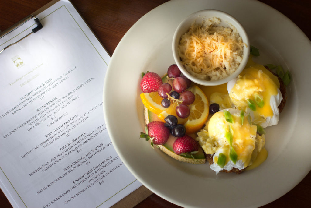Poached Eggs over Fried Green Tomatoes is an elegant brunch pairing.