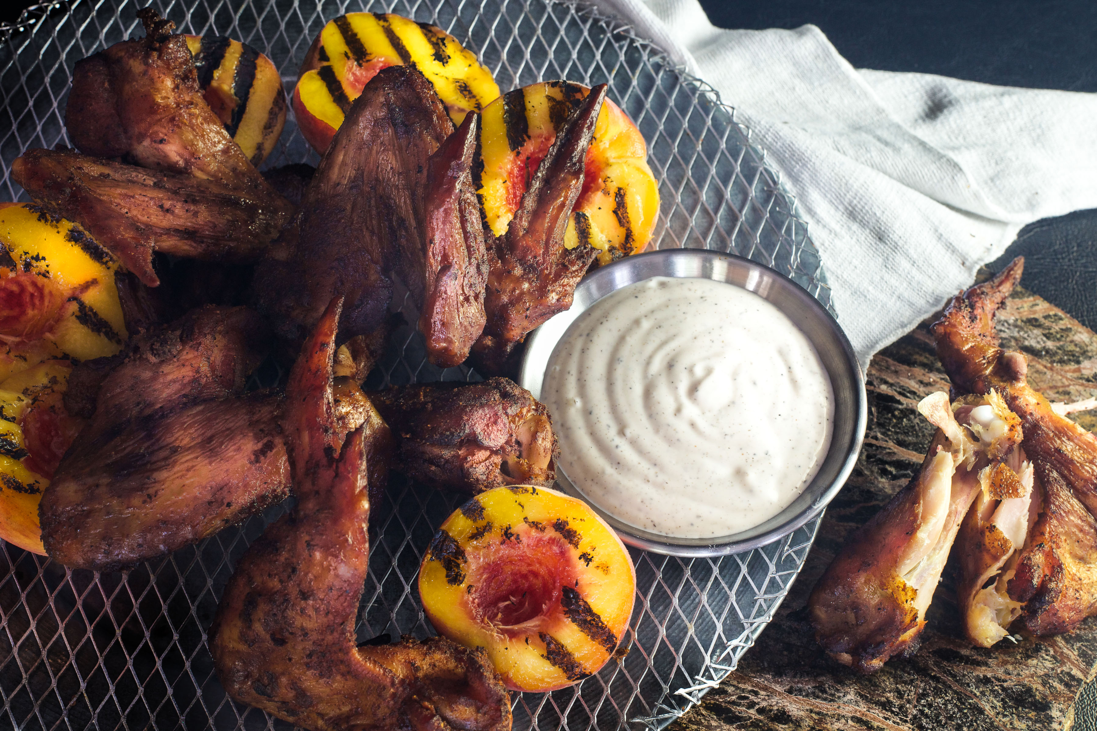 Chicken Wings with Alabama White Sauce and Grilled Peaches - Acadiana Table